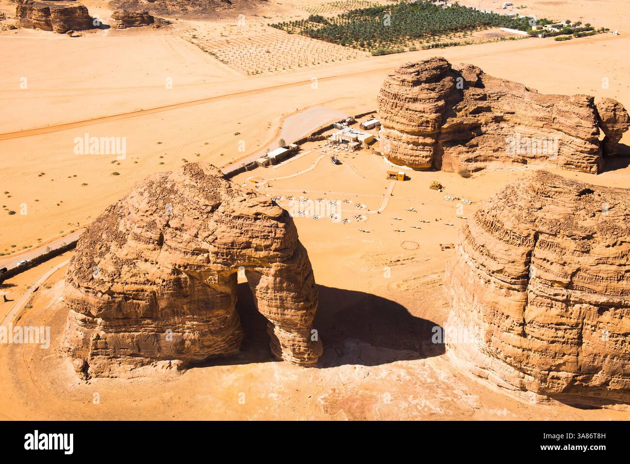Aerial view of the Jabal Alfil (Elephant Rock), a natural red sandstone ...