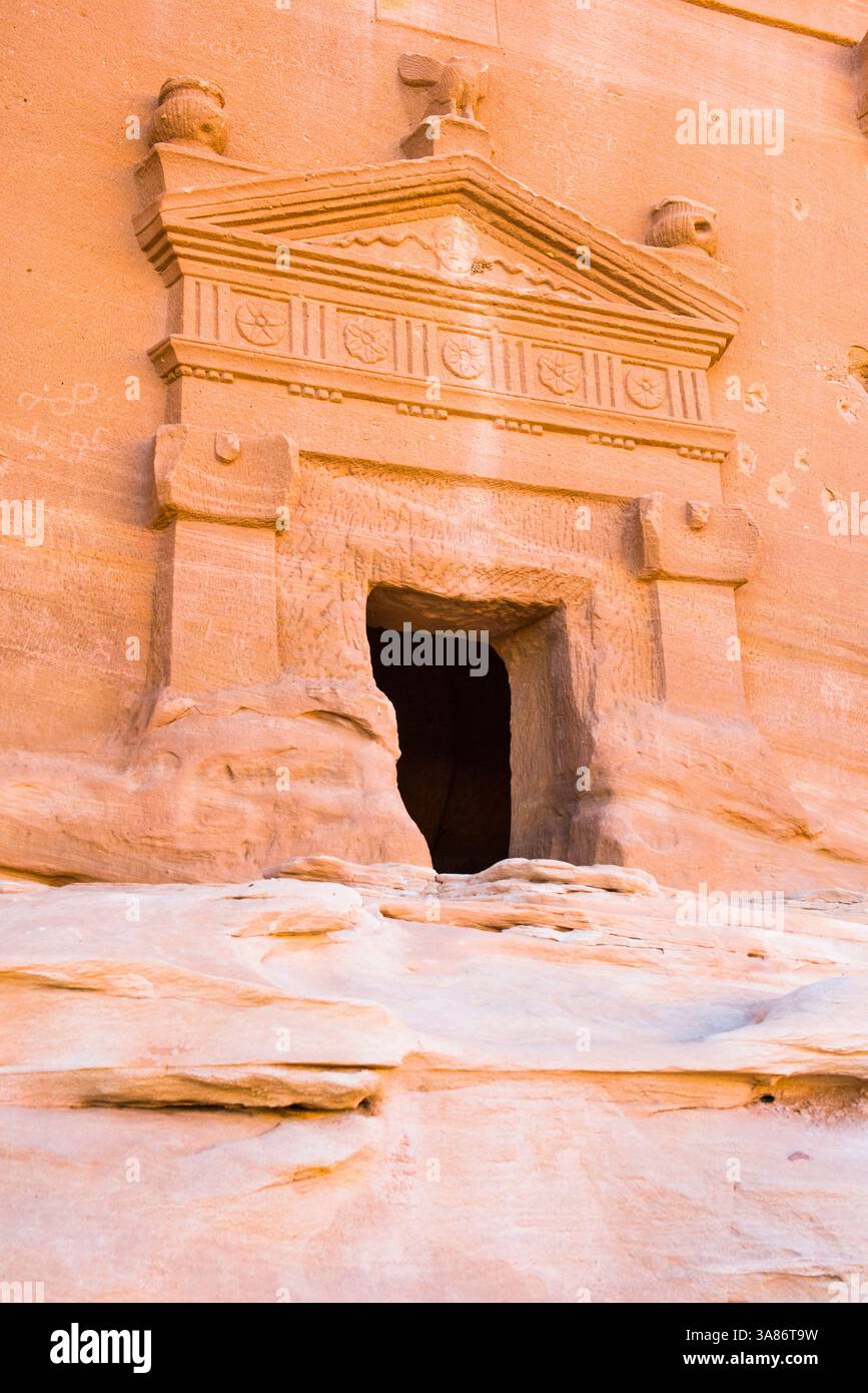 Tomb carved into sandstone rock of Jabal Banat (Qasr Al-Bint) area in ...