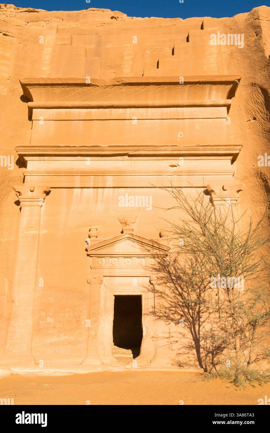 Tombs carved into sandstone rock of Jabal Banat (Qasr Al-Bint) area in ...