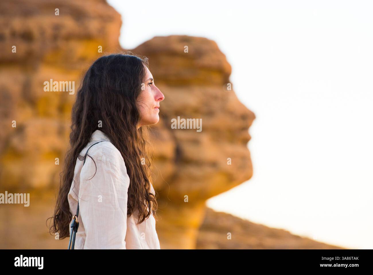 Woman in front of Face Rock, a sandstone rock formation in shape of ...