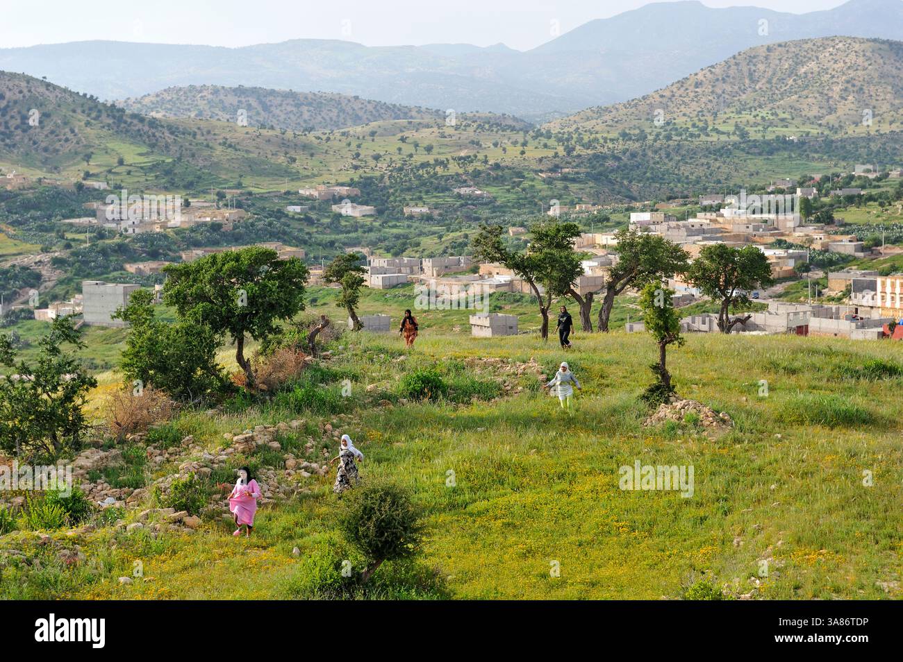 Women running through the hills of Souss-Massa valley, Morocco Stock ...