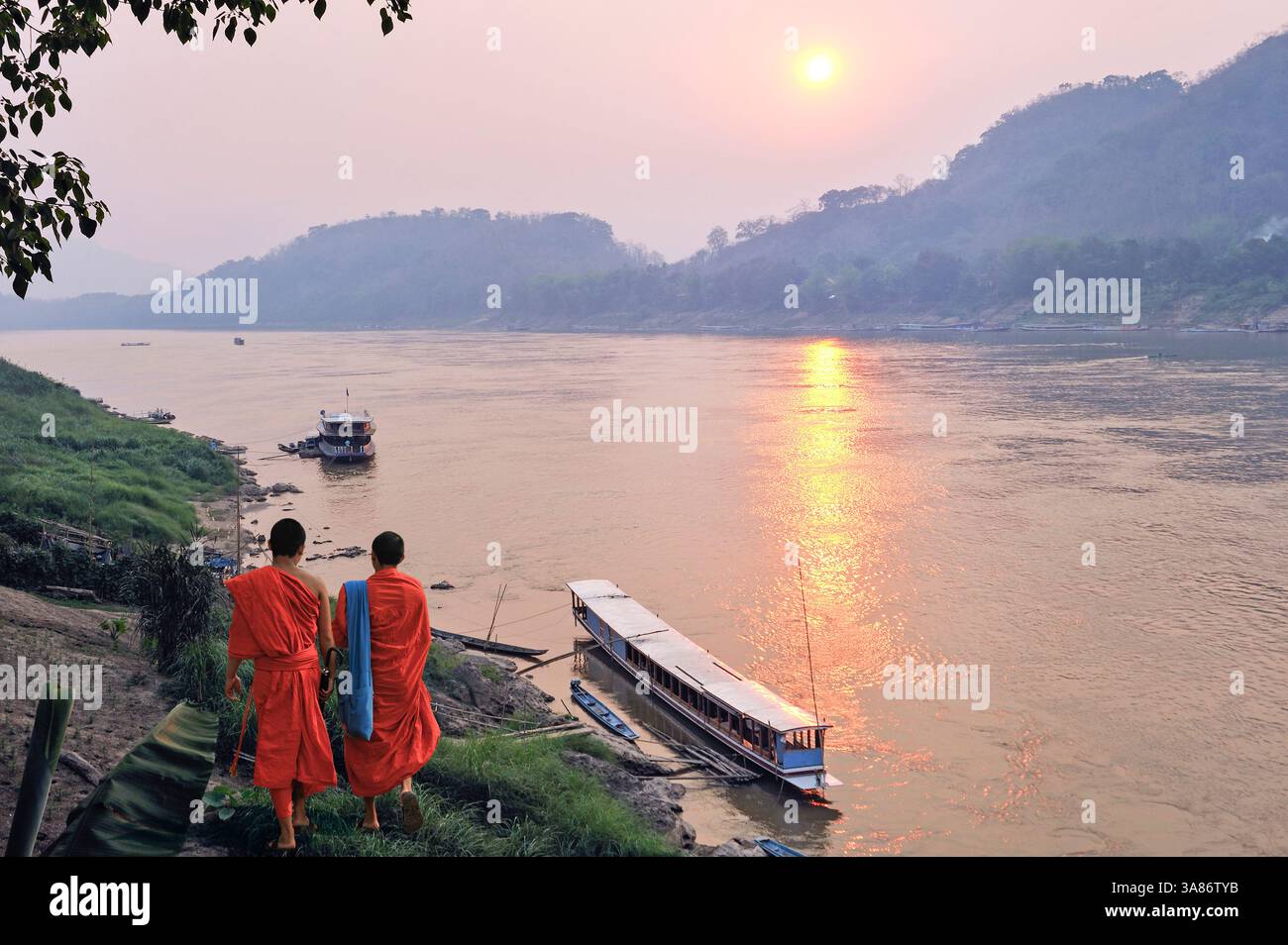 Monks on riverbank hi-res stock photography and images - Alamy