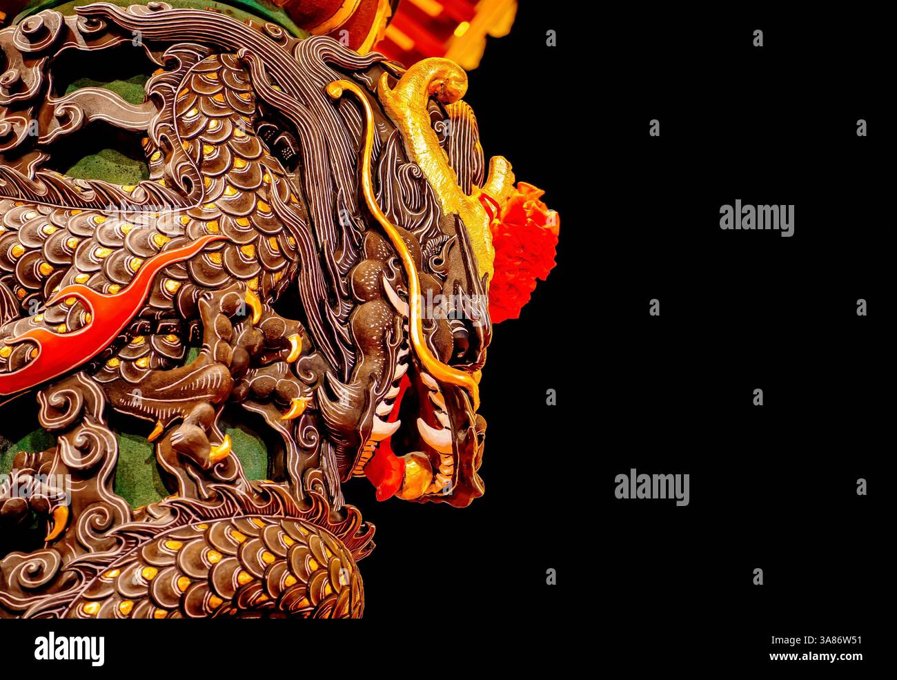 Exquisite carvings of dragons on the pillars at the temple of the ...