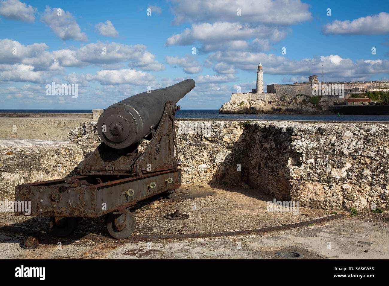 Centuries Old Cannon, Castillo Del San Salvador in foreground, Castillo ...