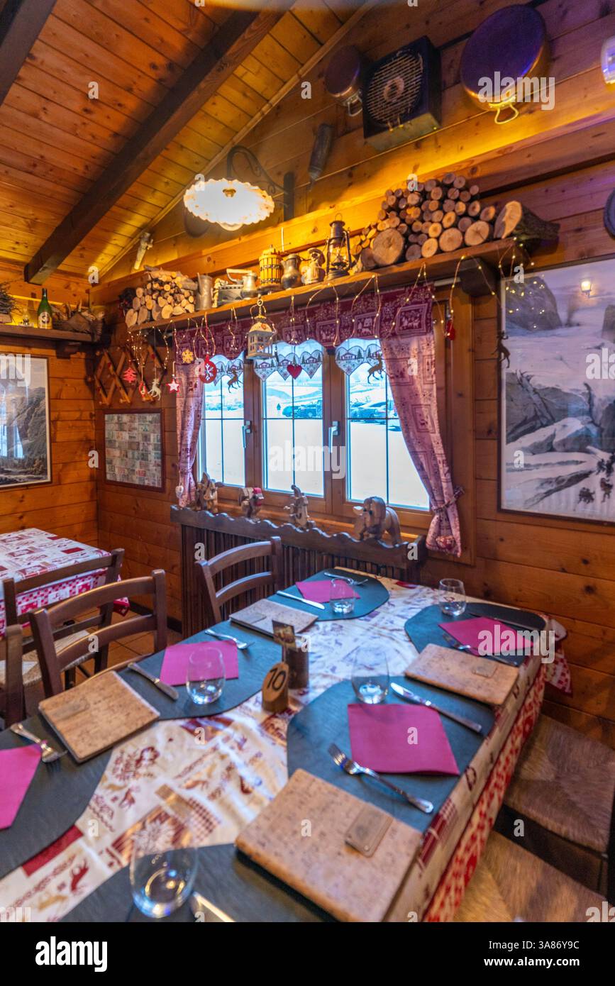 Interior view of typical wooden chalet cafe in Entreves in winter ...