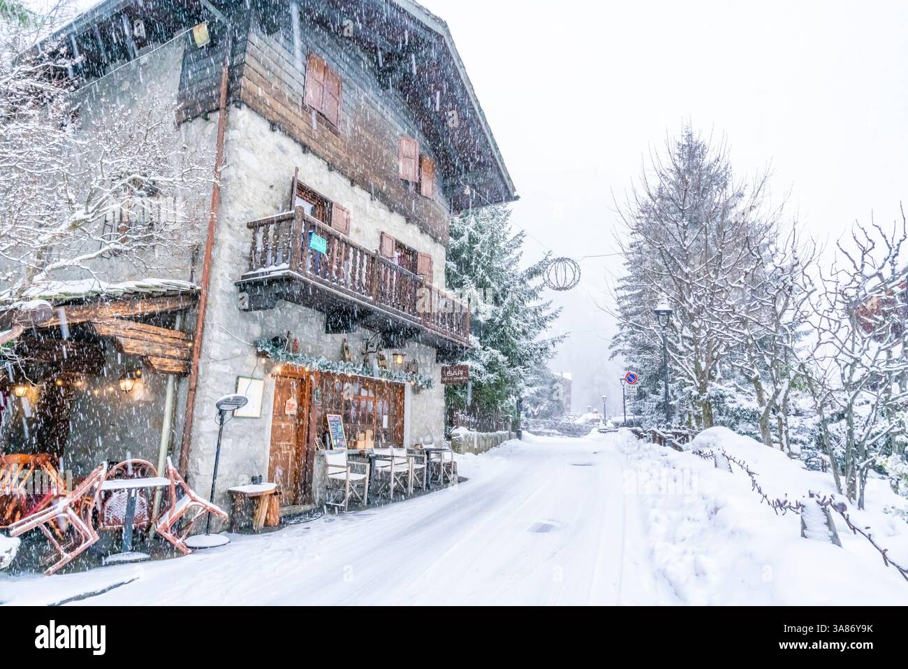 View of snow covered wooden houses in Entreves in winter, Entreves ...