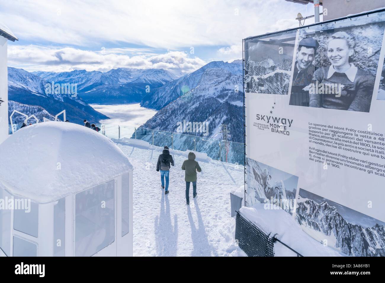 View of snow covered Aosta Valley from refuge cabin at Pavillon du Mont ...