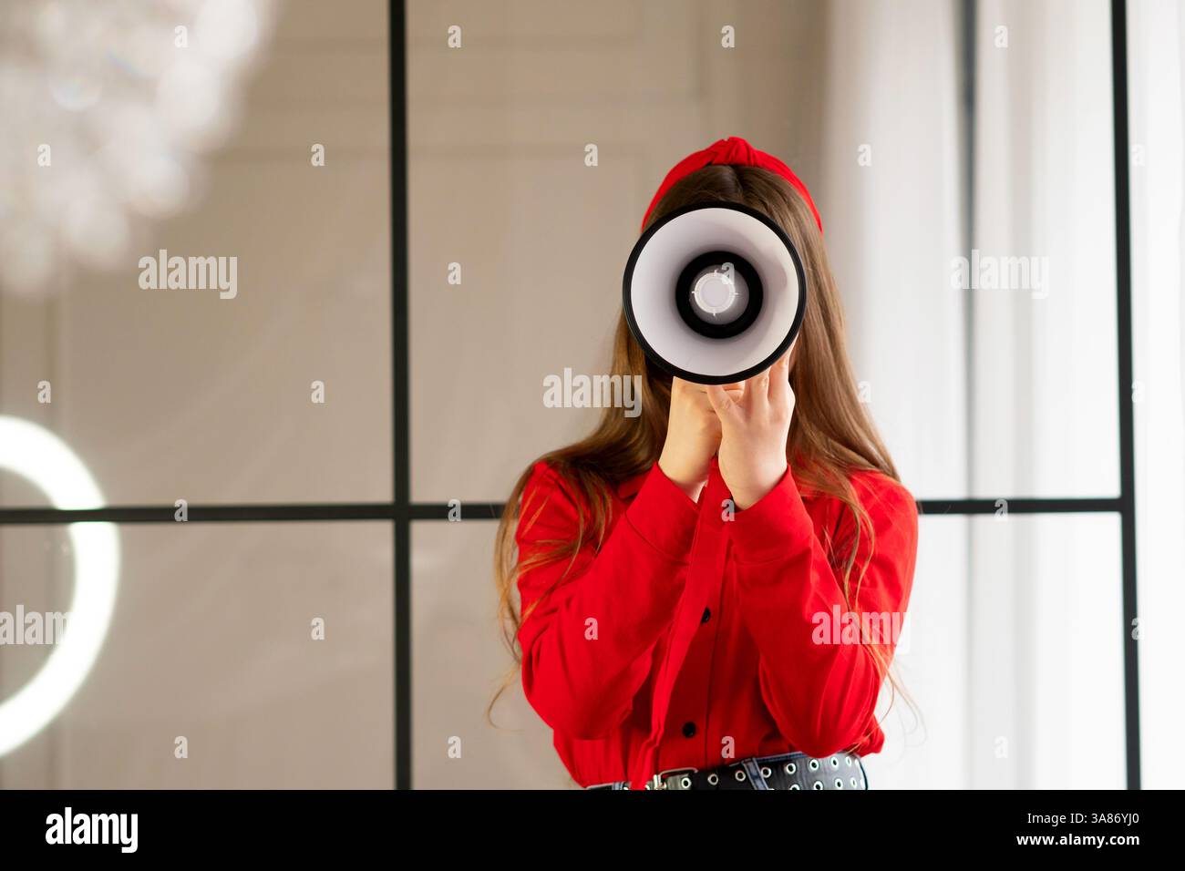 Teen girl megaphone shouting hi-res stock photography and images - Alamy