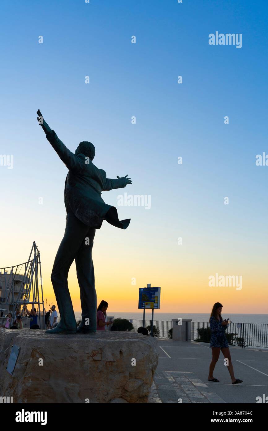 The statue of Domenico Modugno, Polignano a Mare, Bari, Apulia, Italy ...