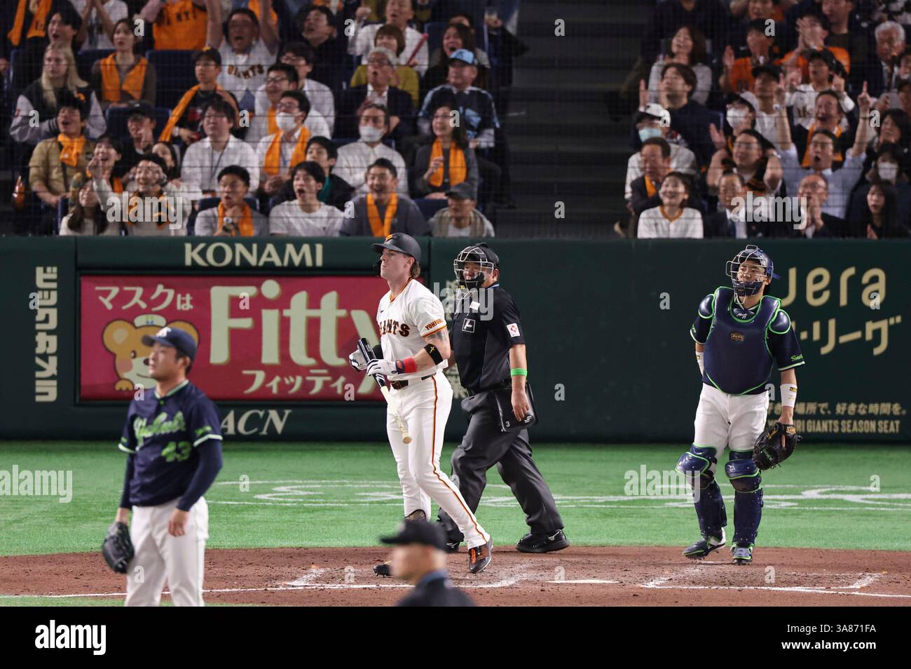 Yomiuri Giants' Trey Cabbage of USA reacts hitting a two-run homer in ...