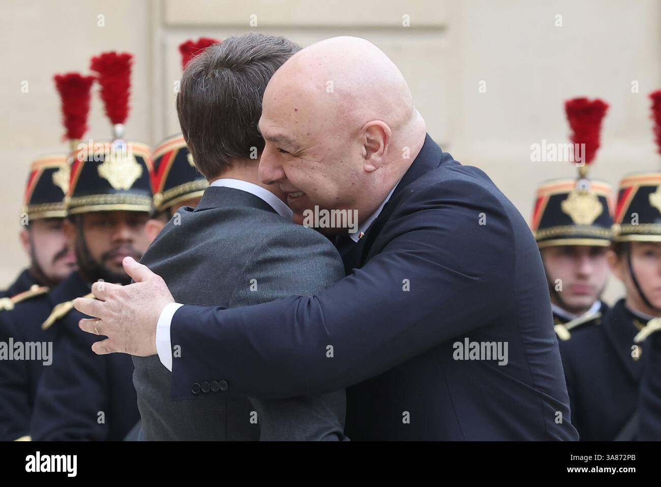 Paris, France. 28th Mar, 2025. French President Emmanuel Macron (L ...