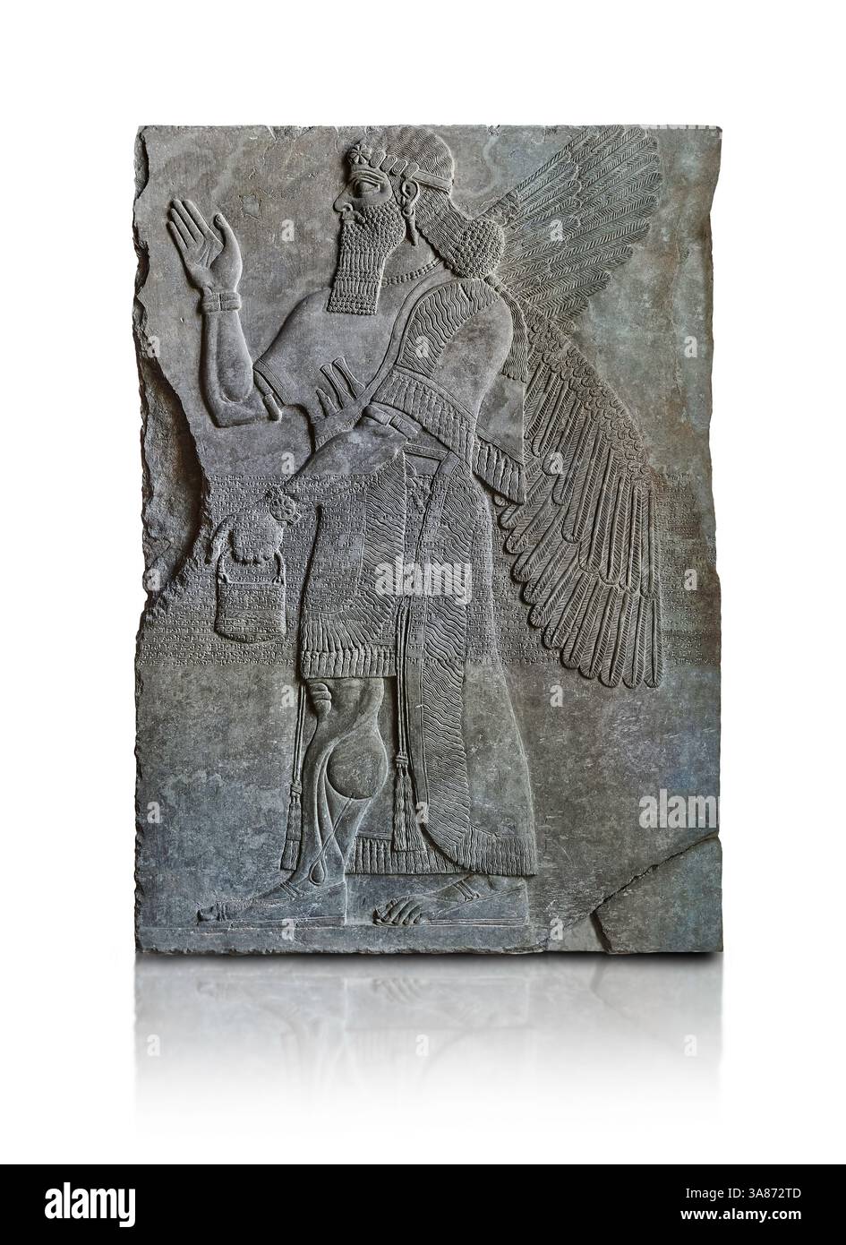 Ancient Neo Assyrian palace relief sculpture depicting a bearded Winged ...