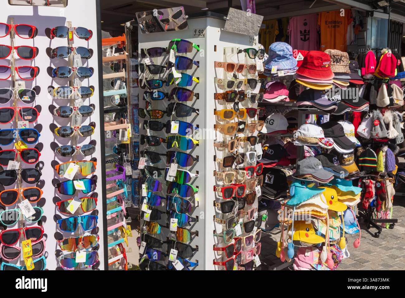 Cyprus, Paphos, Souvenir Shop display of Colourful Sunglasses and Hats ...