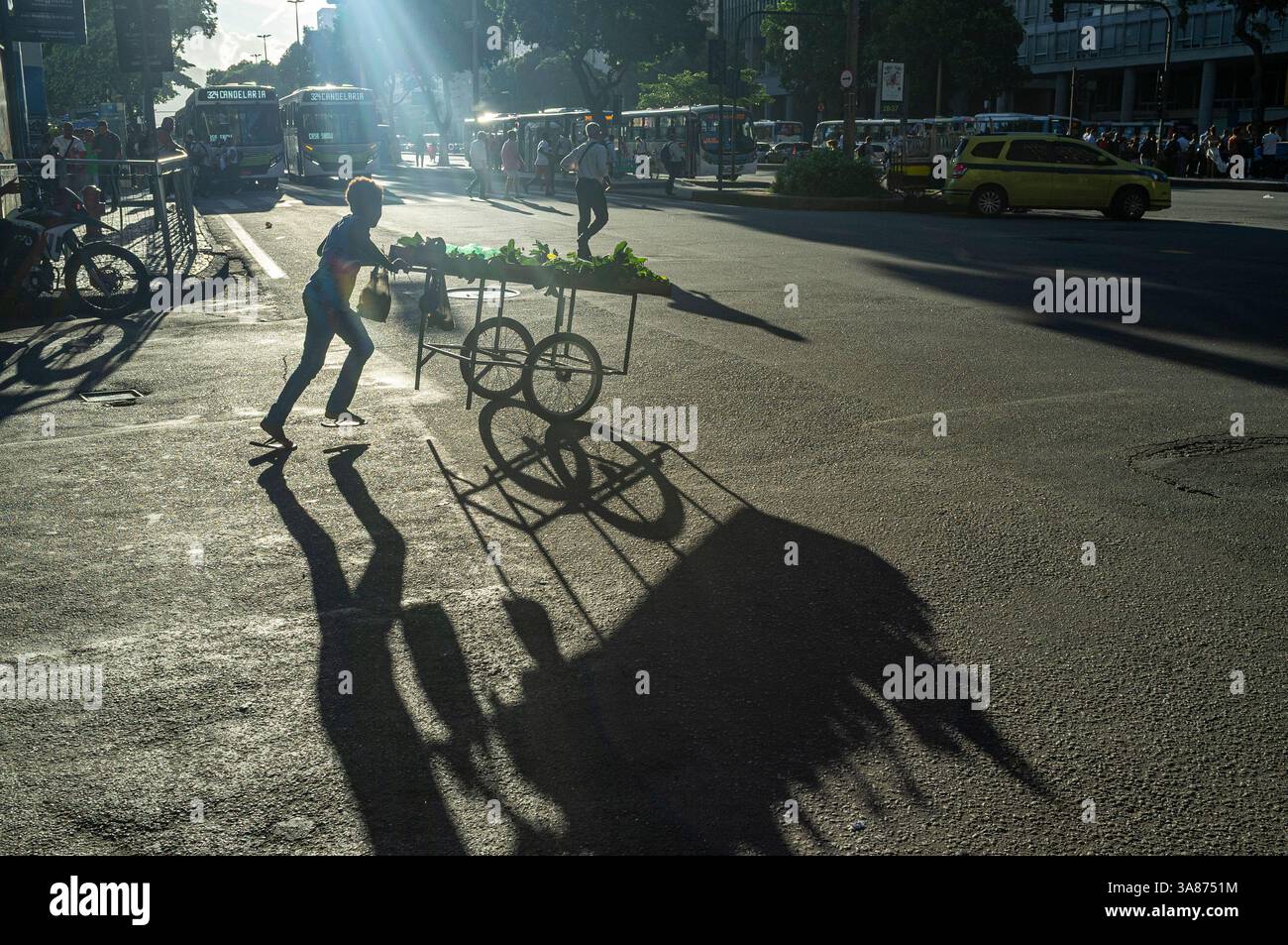 Child labor, boy works as street vendor selling vegetables in Rio de ...