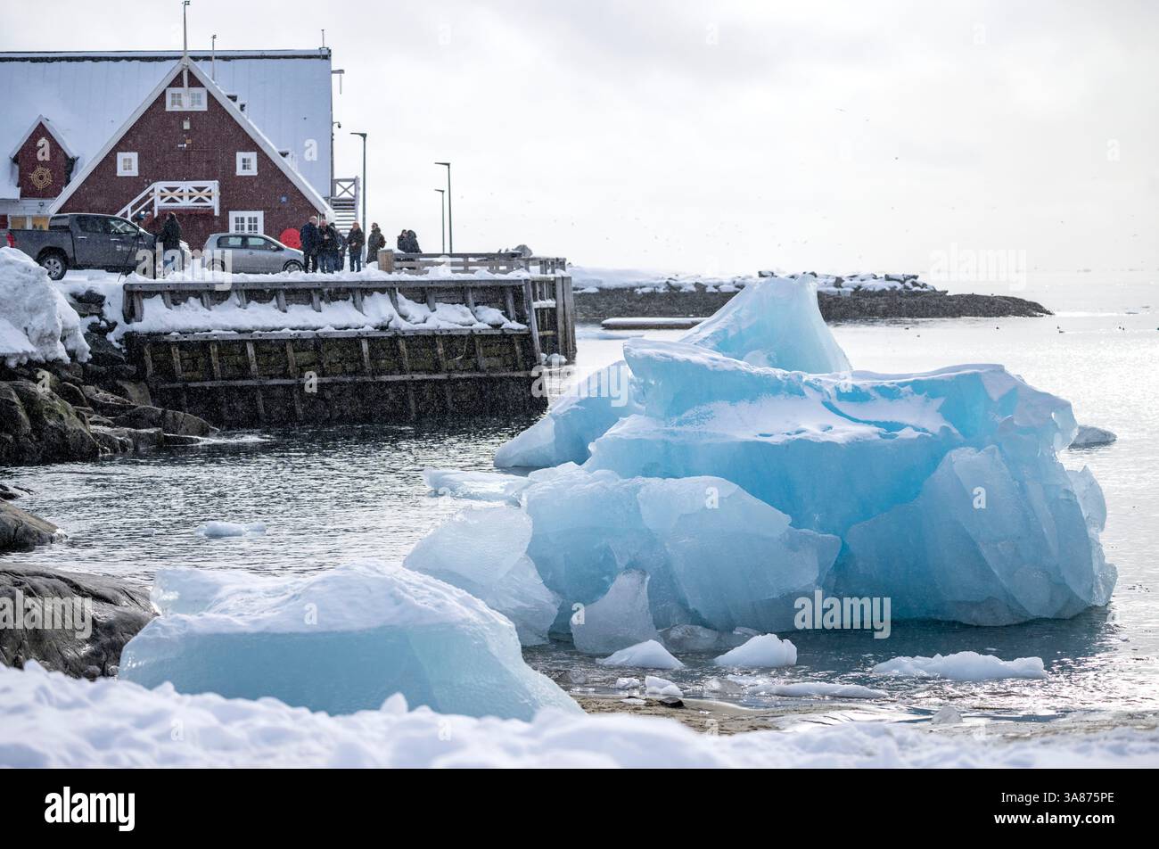Nuuk, Greenland. 27th Mar, 2025. Iceberg washed up on the beach at The ...