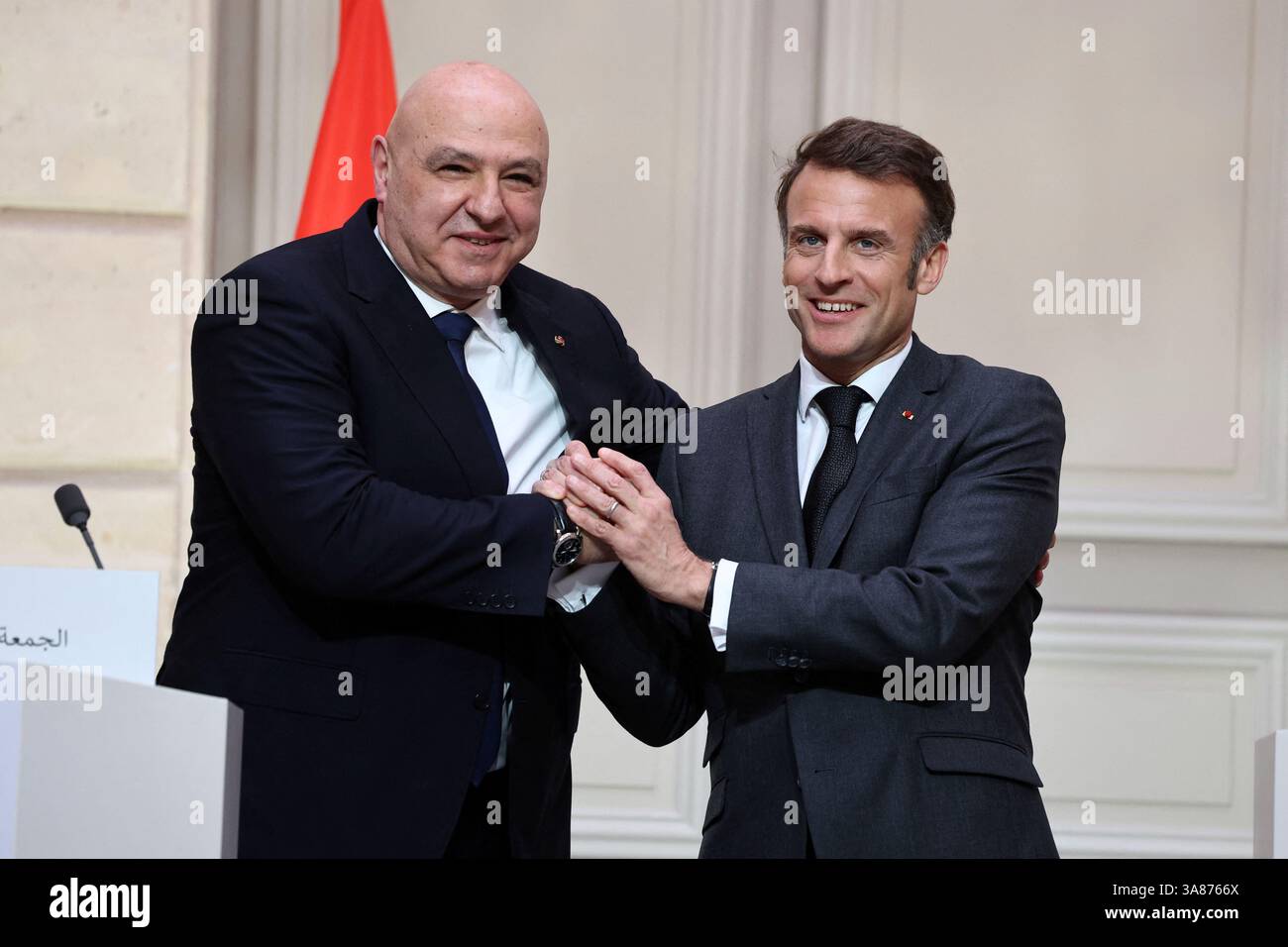 French President Emmanuel Macron, right, and Lebanese President Joseph ...