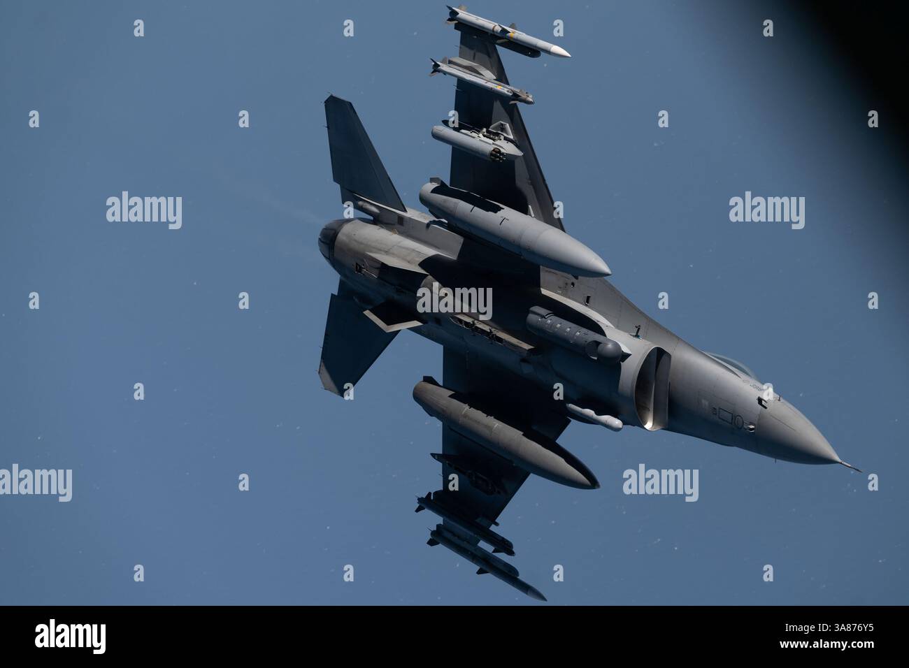 A U.S. Air Force F-16 Fighting Falcon flies a Defensive Counter-Air ...