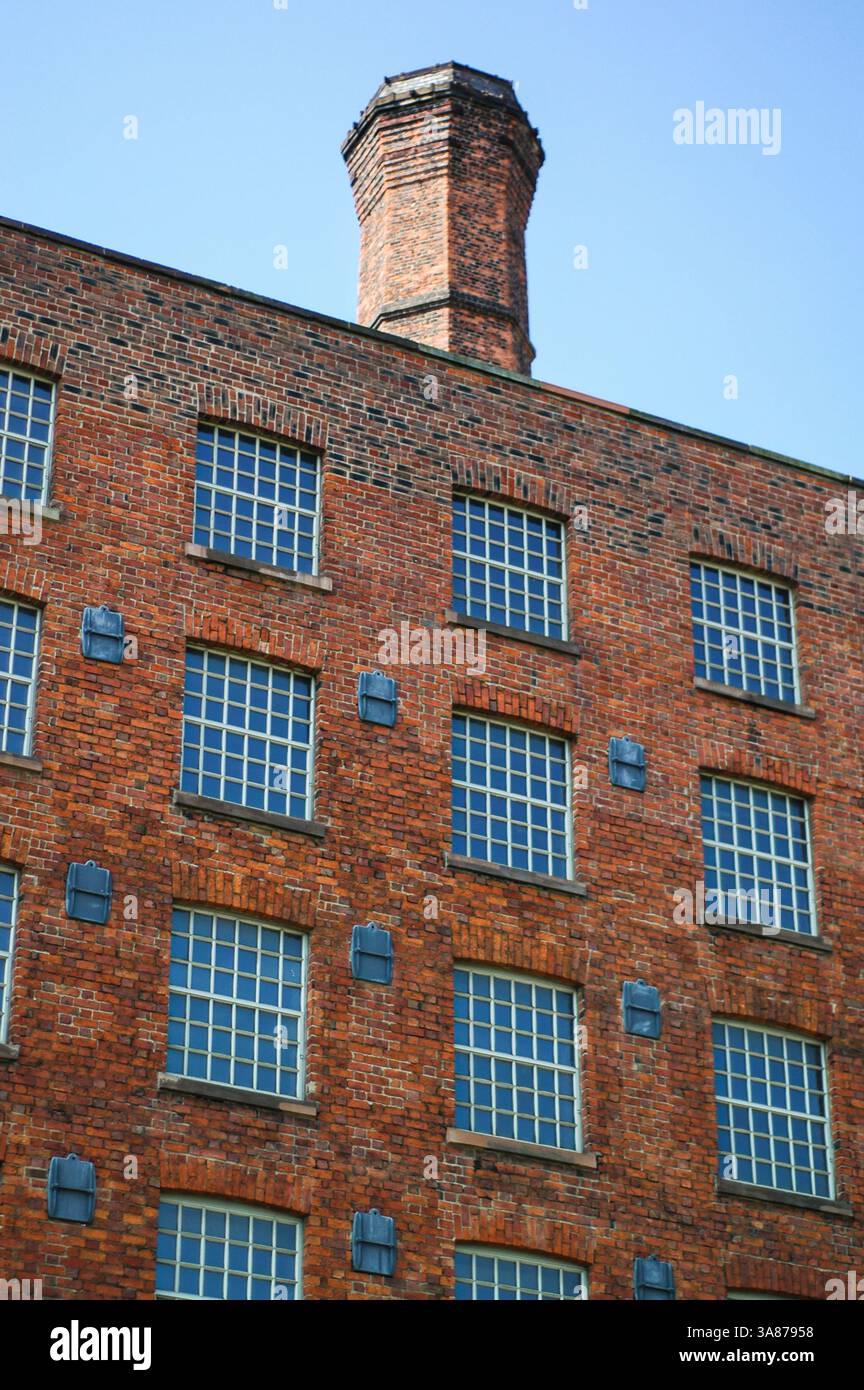 The windows and chimney of Royal Mill in Ancoats, Manchester Stock ...