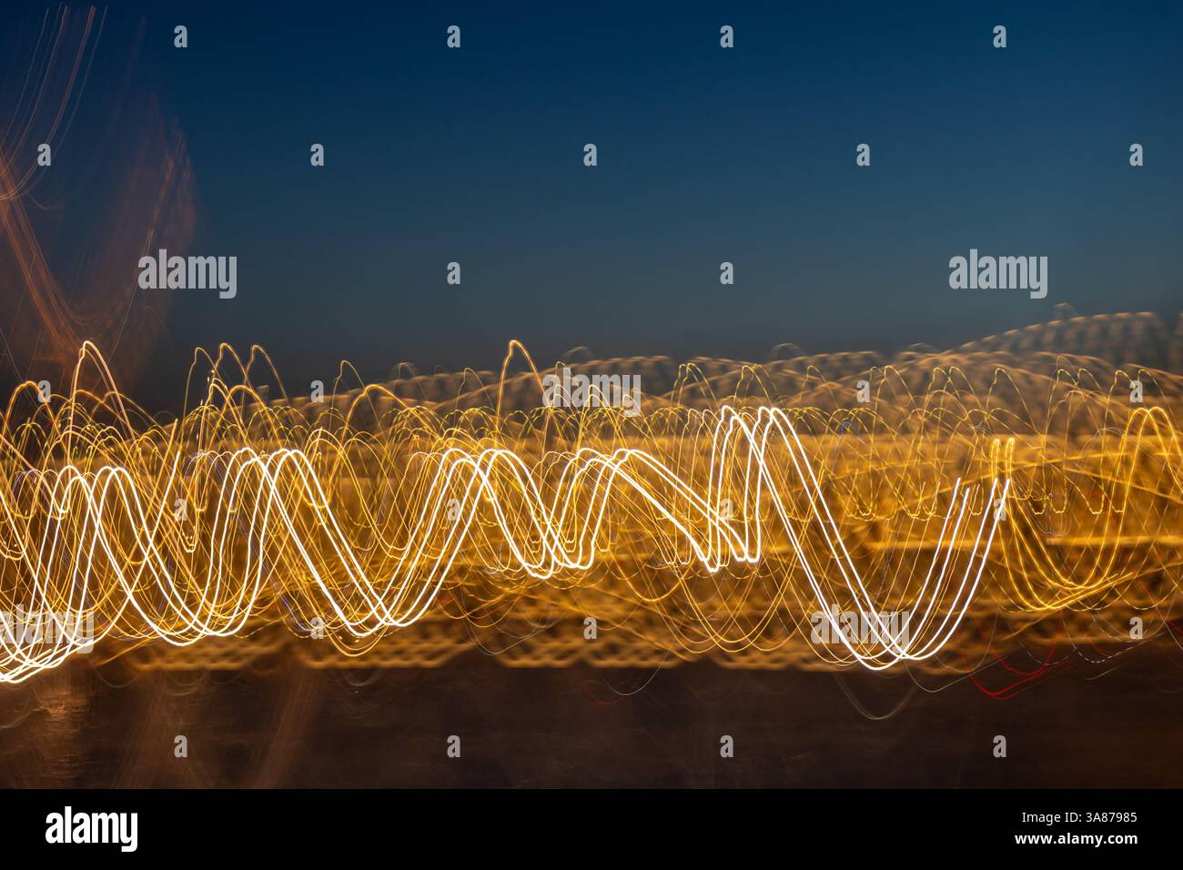 Creative dynamic background with lights captured in motion with long ...