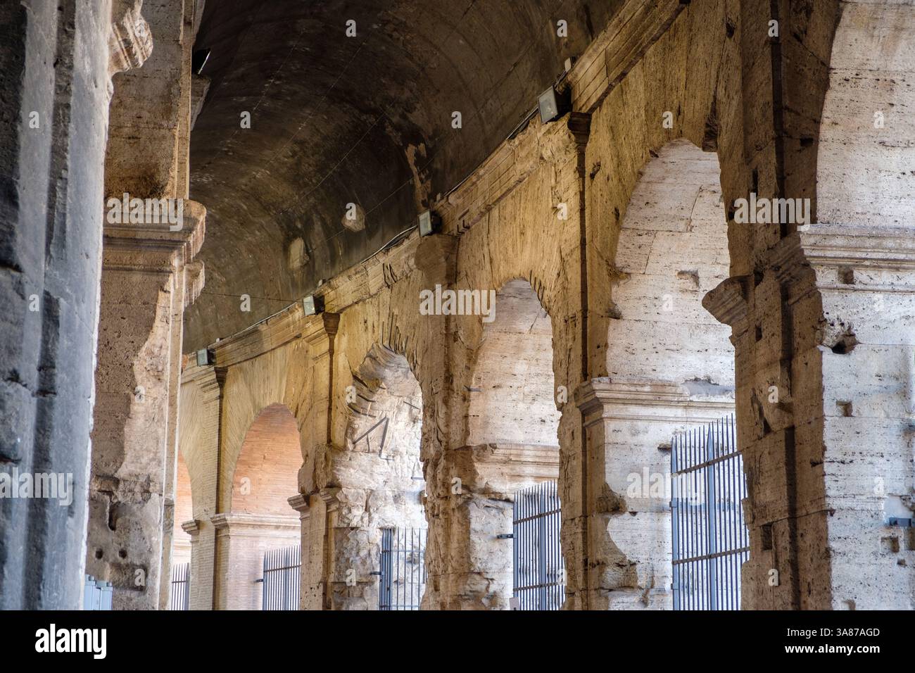 A view down one of the inner corridors of the Colosseum in Rome, Italy ...