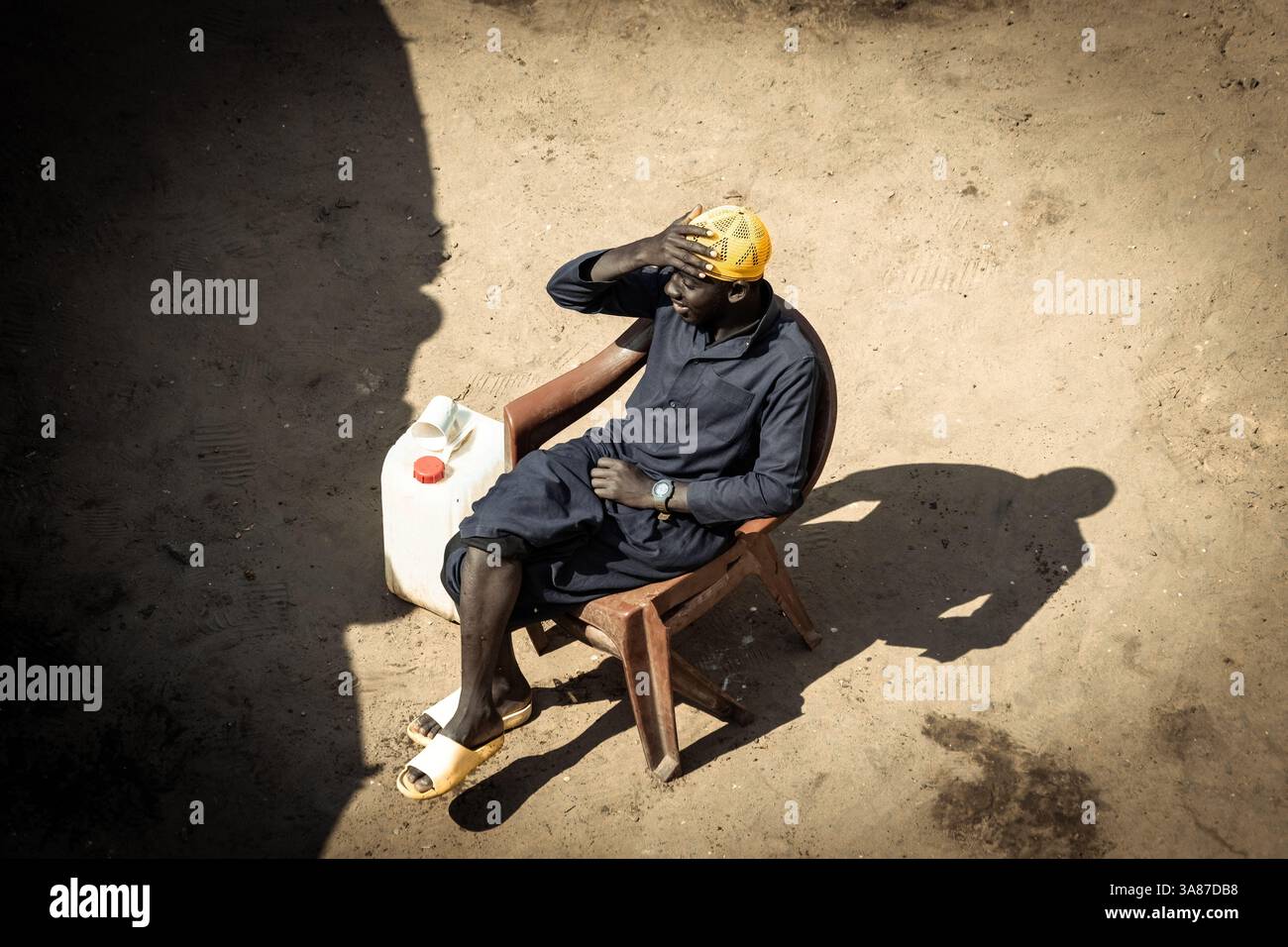 African man sitting in his house yard view from above Senegal Stock ...