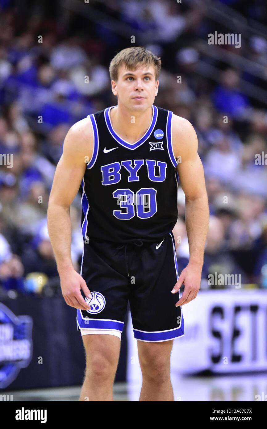 Newark, USA. 27th Mar, 2025. BYU's Dallin Hall (30) during the East ...