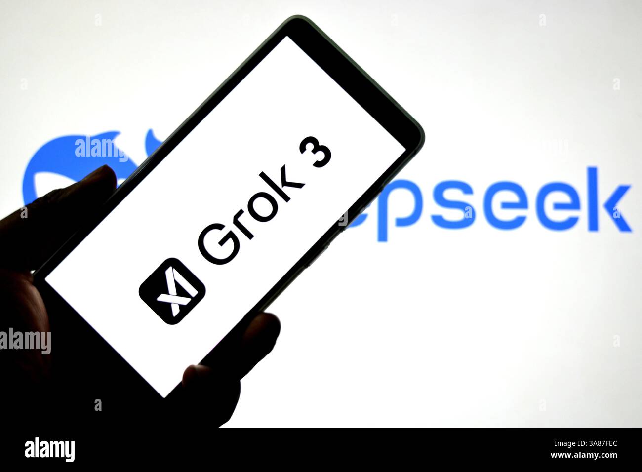 In this photo illustration, a Grok 3 logo is seen displayed on a ...