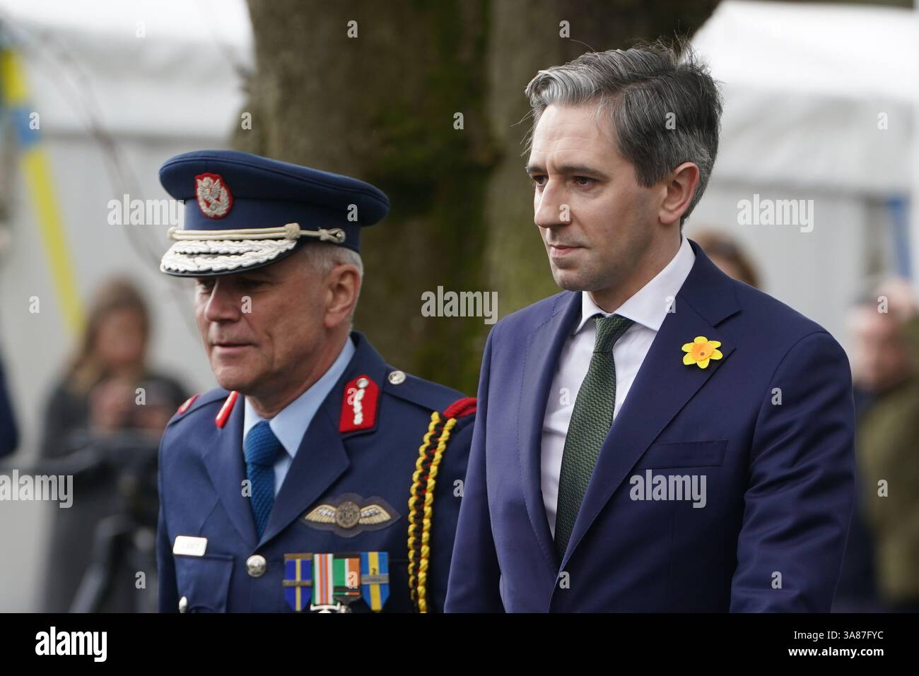 Tanaiste and Minister for Defence Simon Harris (right) and Defence ...
