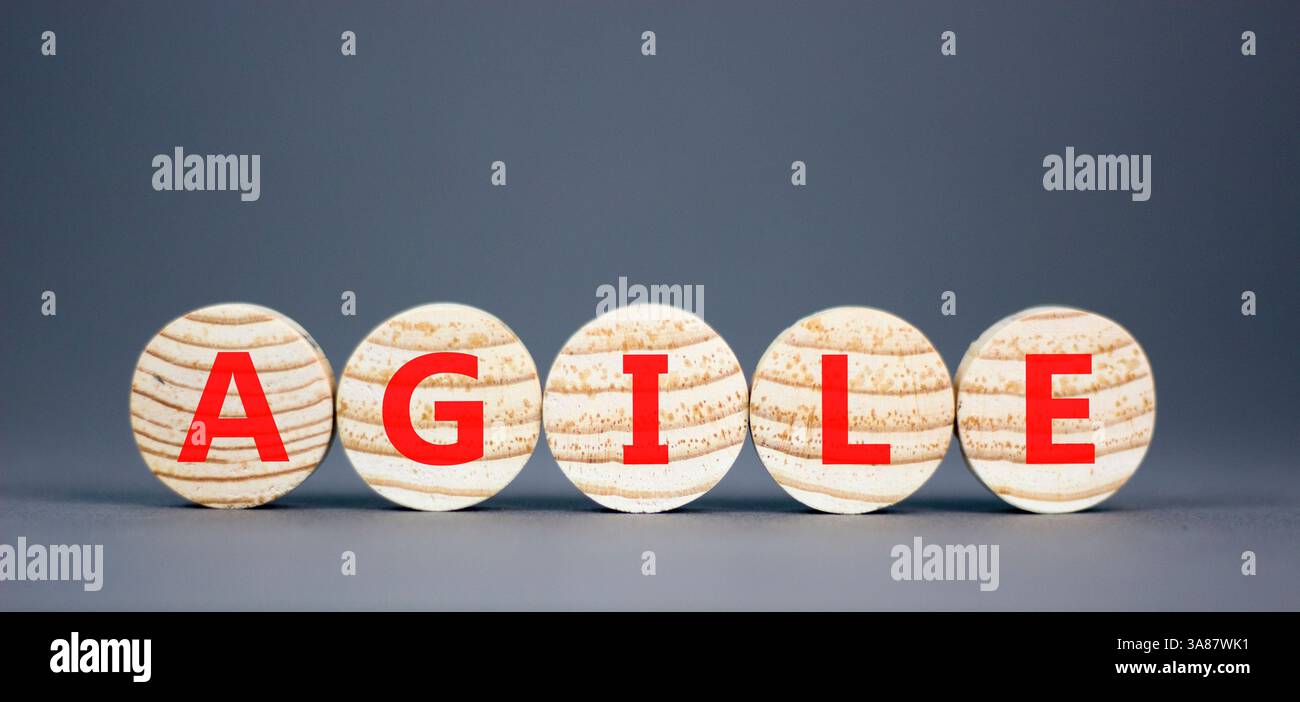 Agile symbol. Concept word Agile on beautiful wooden circles. Beautiful ...