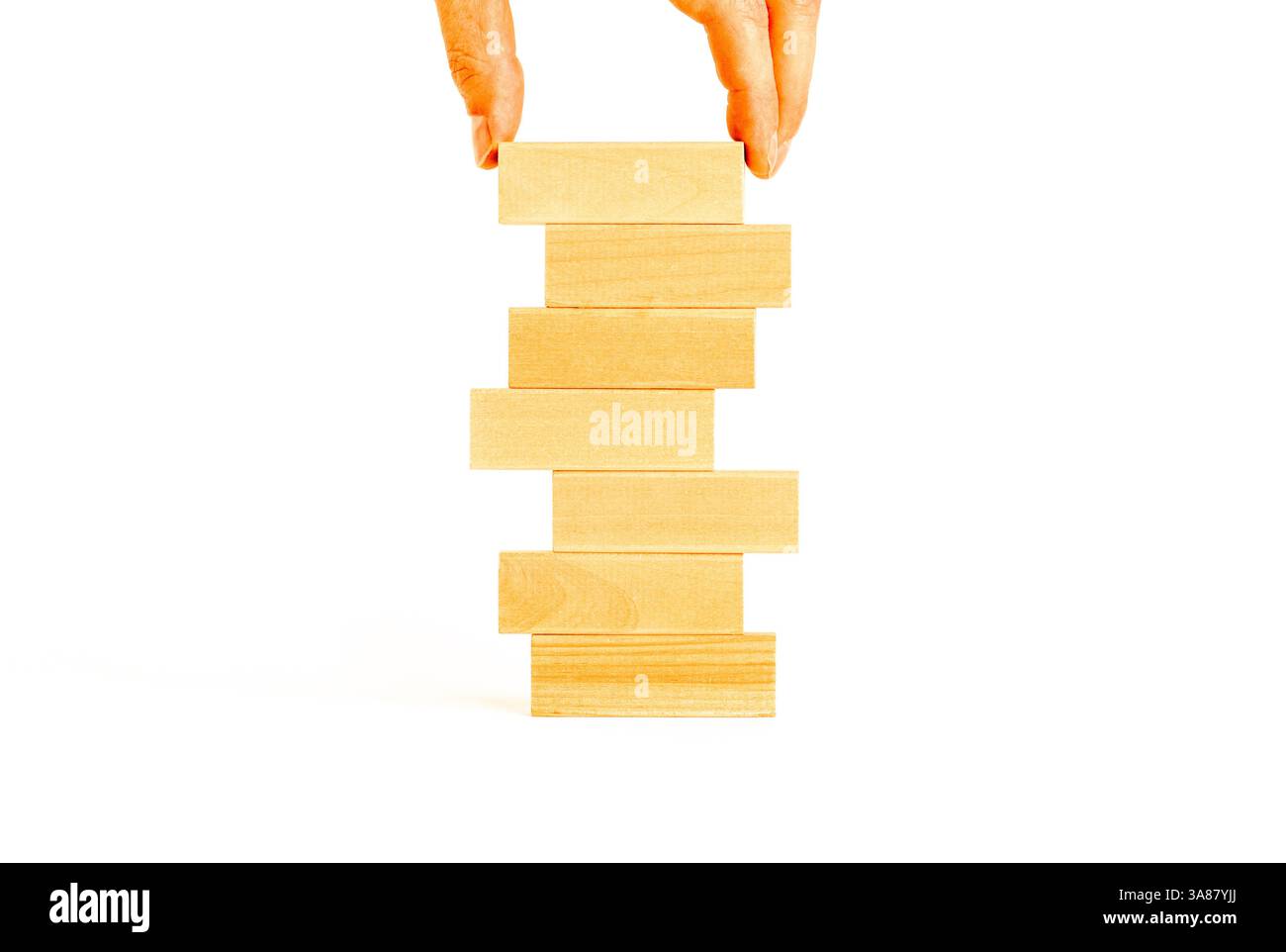Man's hand stacking blank wooden blocks. Business development concept. Solution, solve problem ...