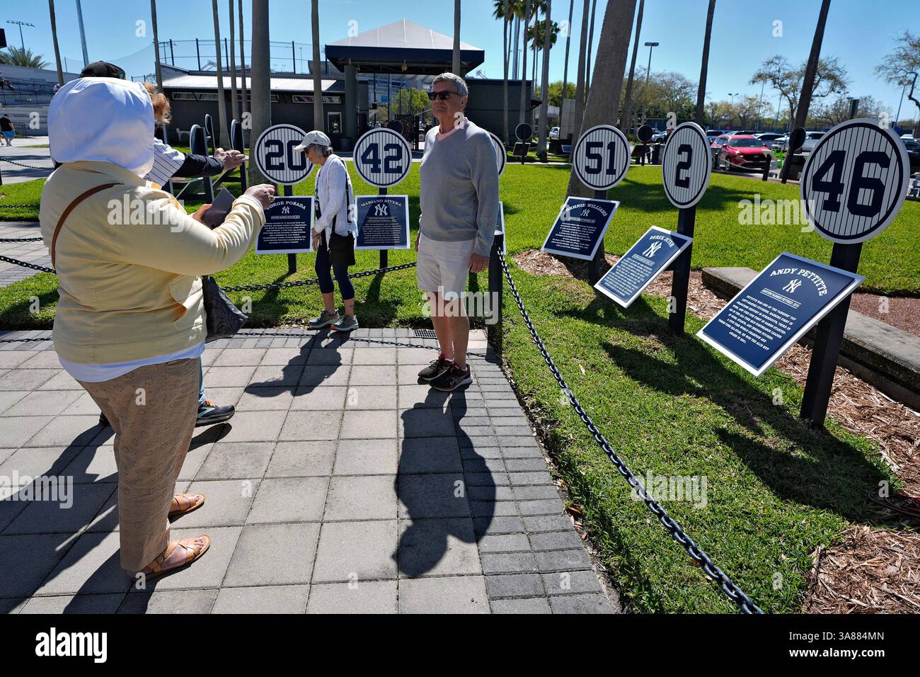 Fans pose for photos in Monument Park at Geroge M. Steinbrenner Field ...