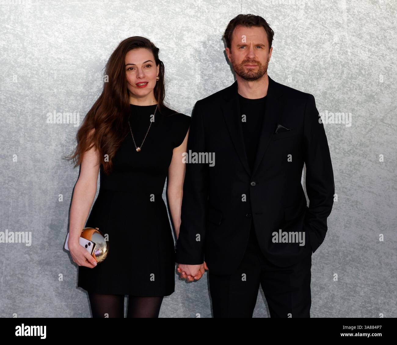 London, UK. 27th Mar, 2025. Andrea Deck and Luke Mably attend the ...