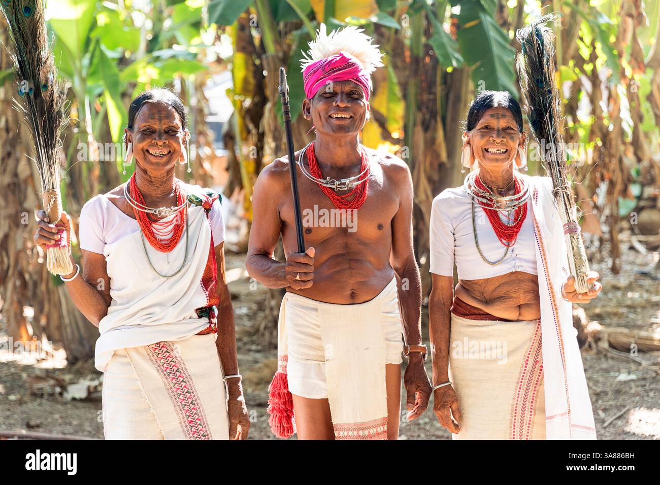Smiling members of Lanjia Saura tribe in their traditional tribal ...
