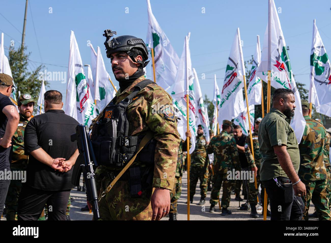 Members of the Iraqi Popular Mobilization Forces attend the annual ...