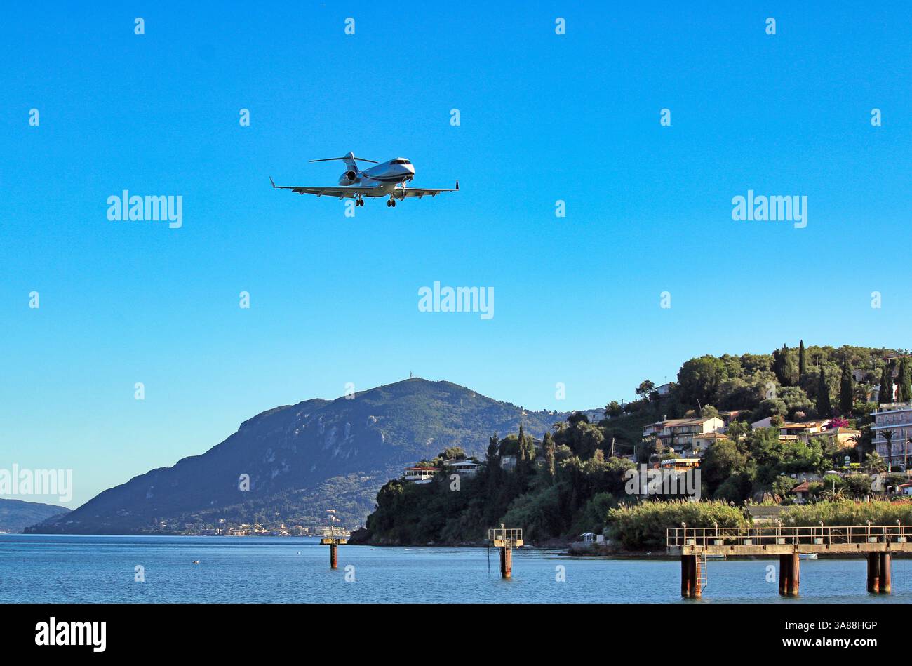 Passenger airplane landing at Kerkyra Airport, Corfu International ...