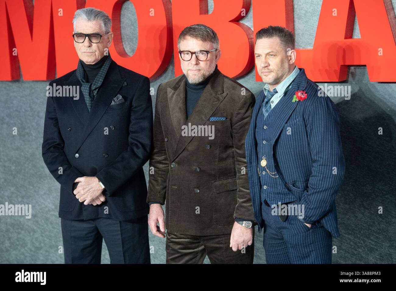 London, UK. 27 Mar, 2025. Pictured: (L-R) - Pierce Brosnan, Director ...