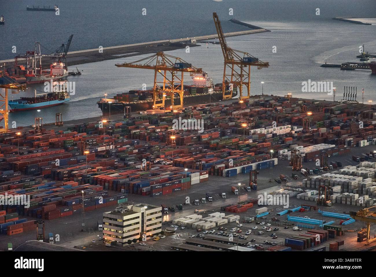 Colorful shipping containers stacked at the Port of Barcelona, Spain ...