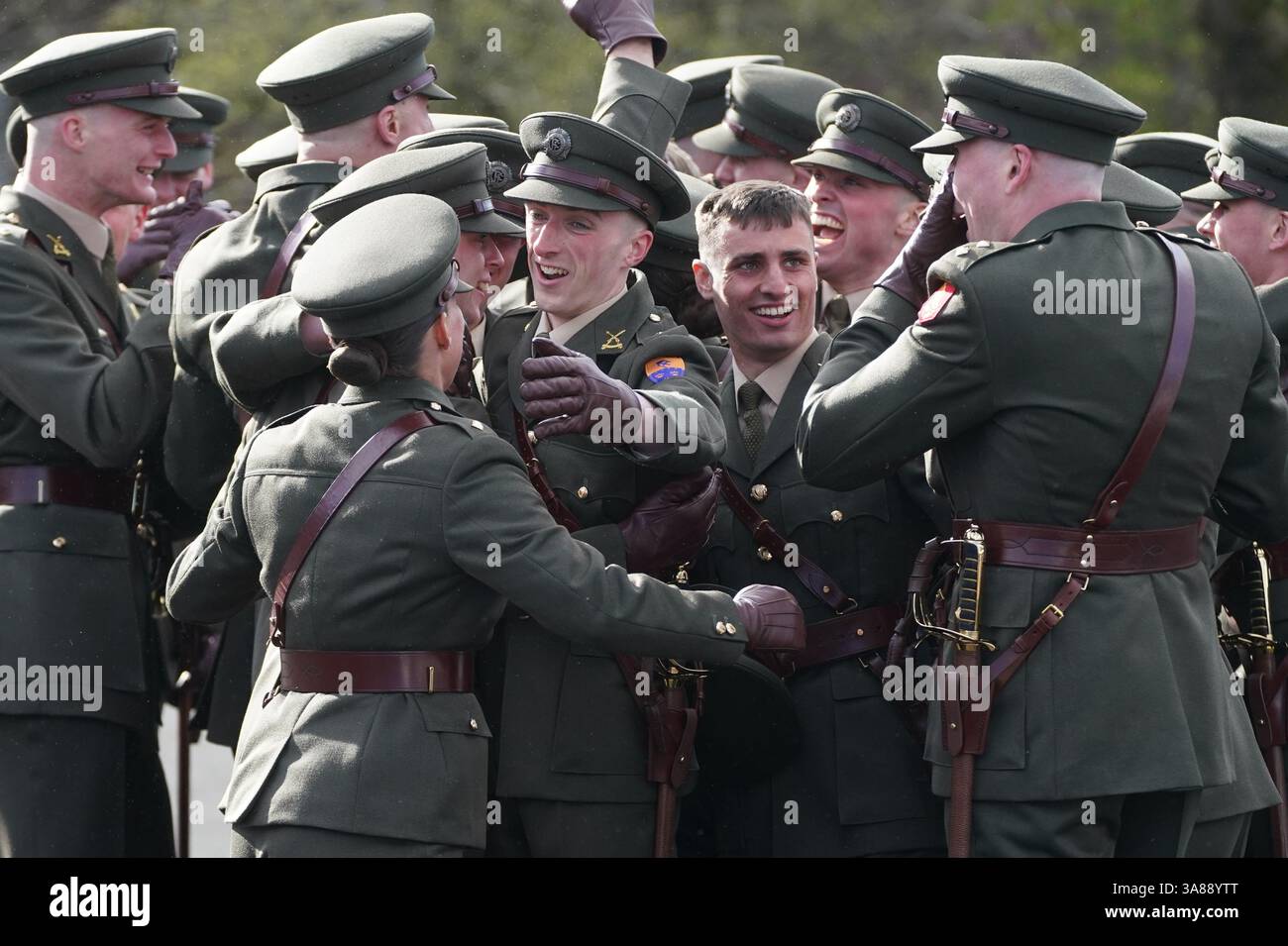 Members of the Defence Forces celebrate after the commissioning ...