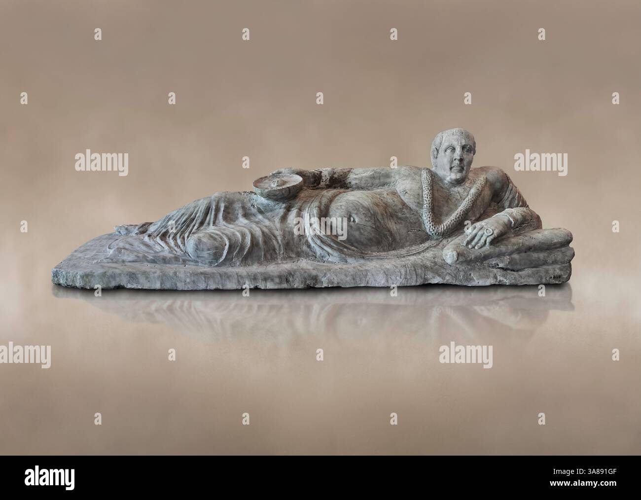 Reclining man on the lid of an Etruscan funerary cinerary urn ...