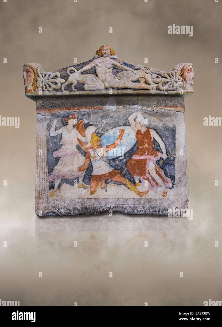 A rare Etruscan full length painted sarcophagus with paintings ...