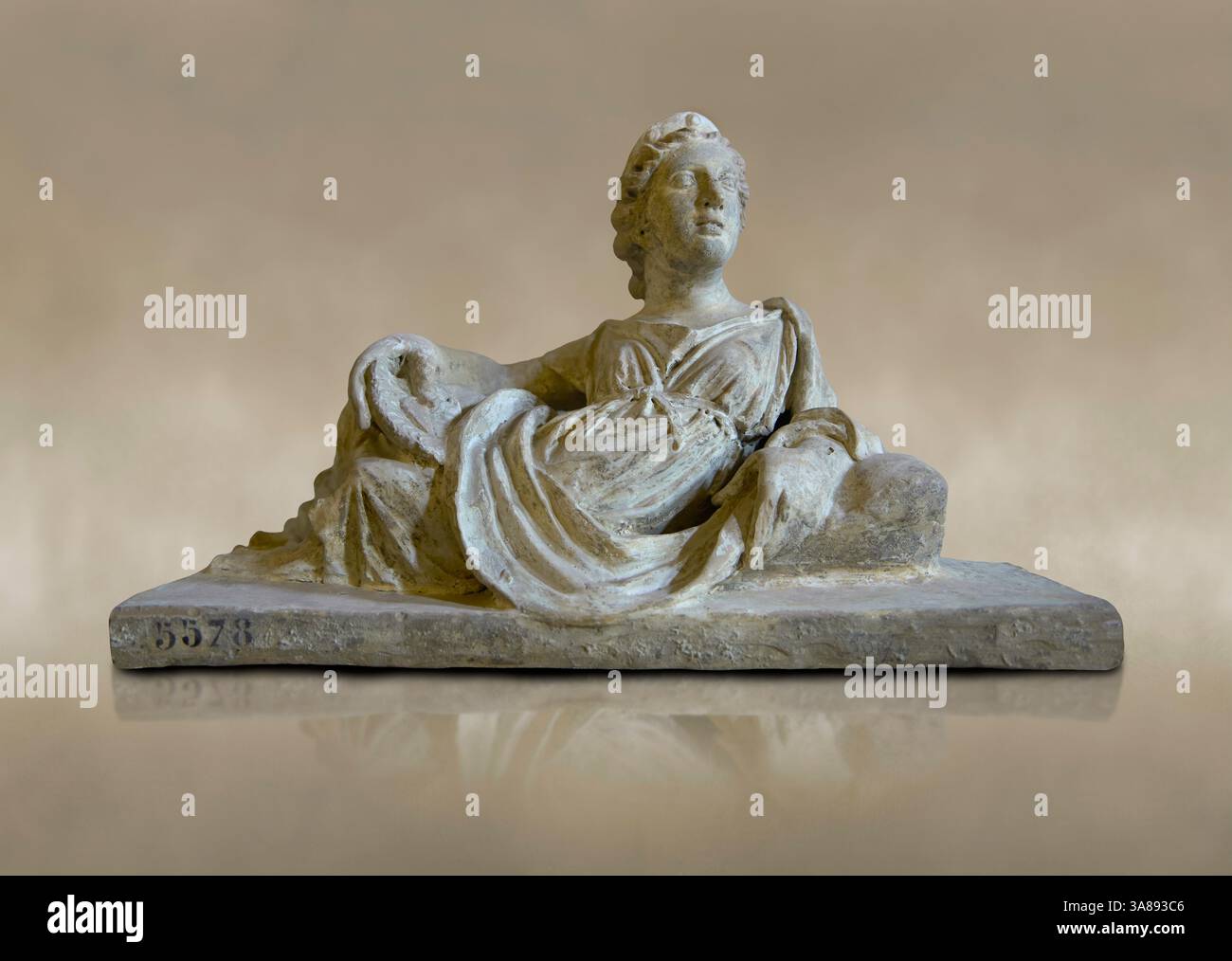 Reclining women on the lid of an Etruscan funerary cinerary urn ...