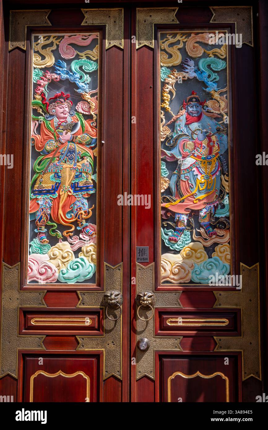 Hong Kong. China- 02.24.2025. Beautiful carved artwork of Menshan, door ...