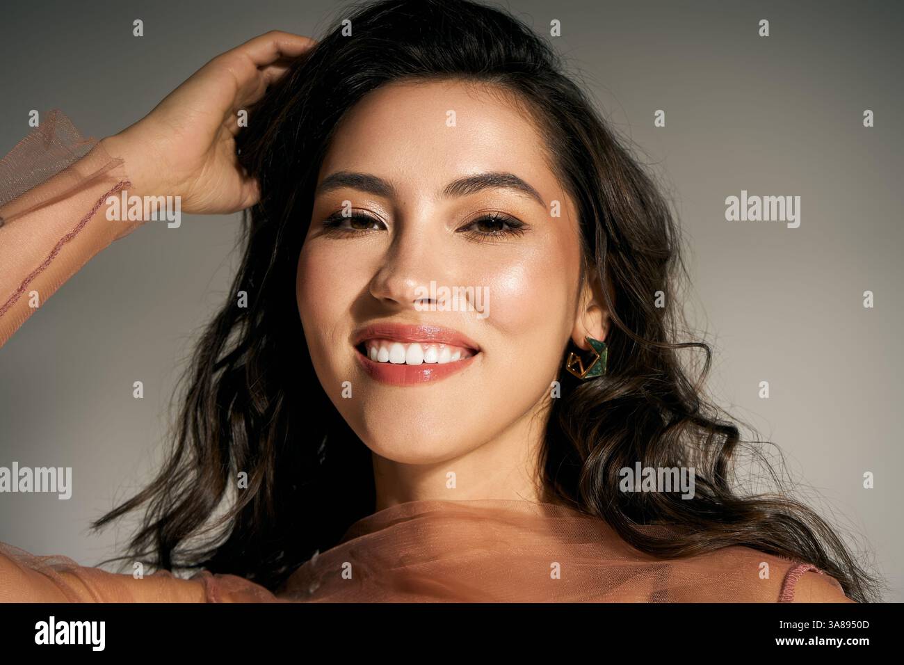 A young, beautiful woman embraces the summer vibes with her joyful ...