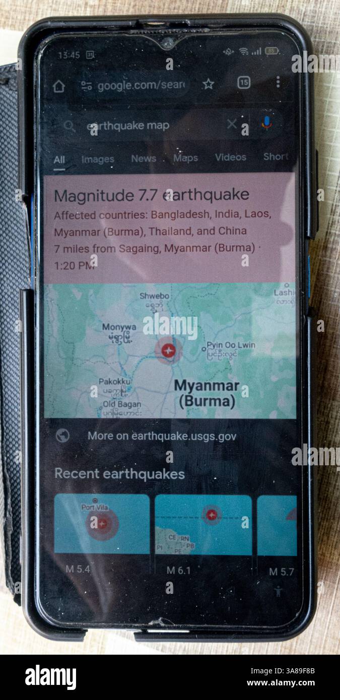 March 28, 2025: Smartphone screen showing Warning of earthquake in ...