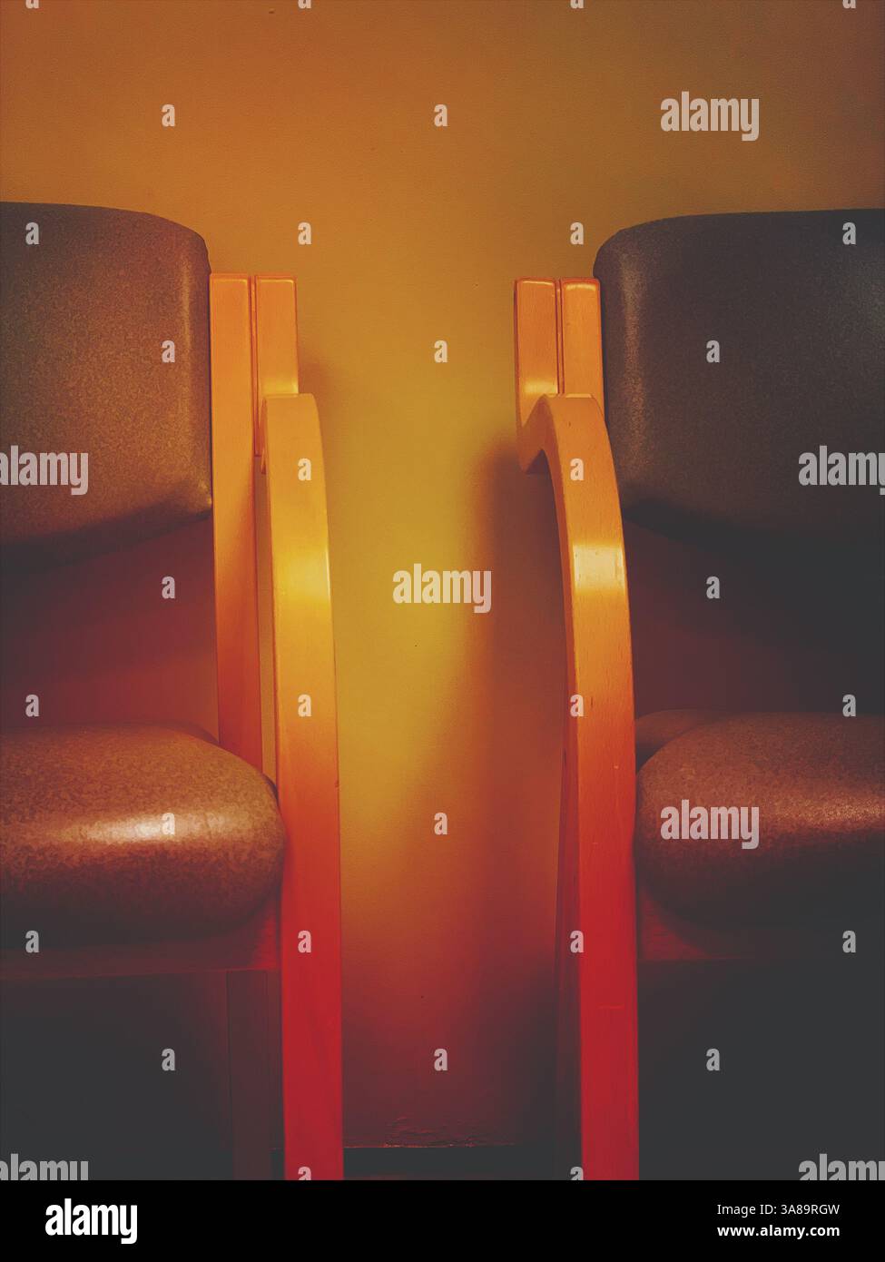 Two empty seats / chairs close up detail in a waiting room - abstract ...