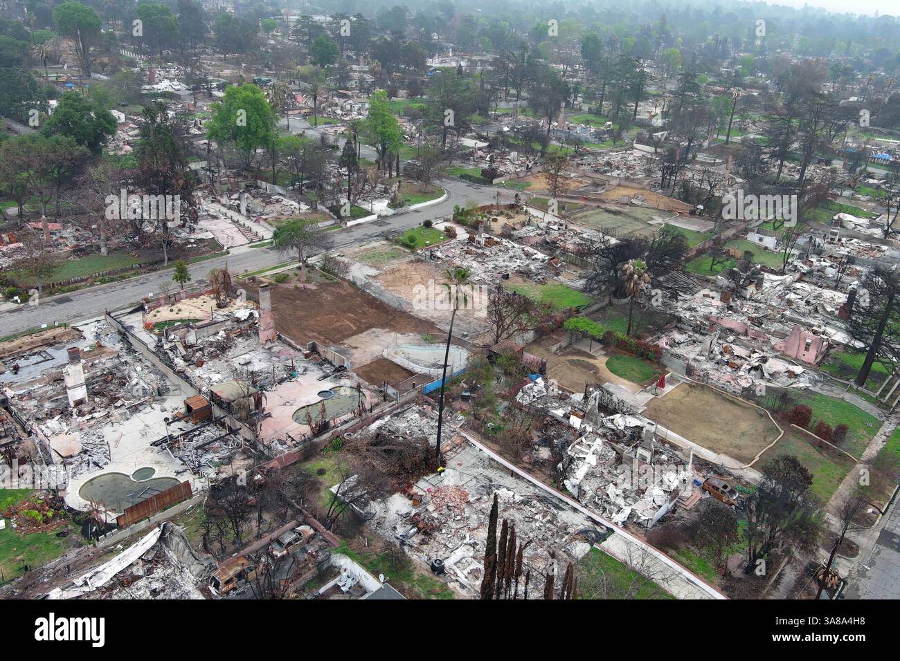 Altadena, United States. 26th Mar, 2025. An aerial view of homes burned ...