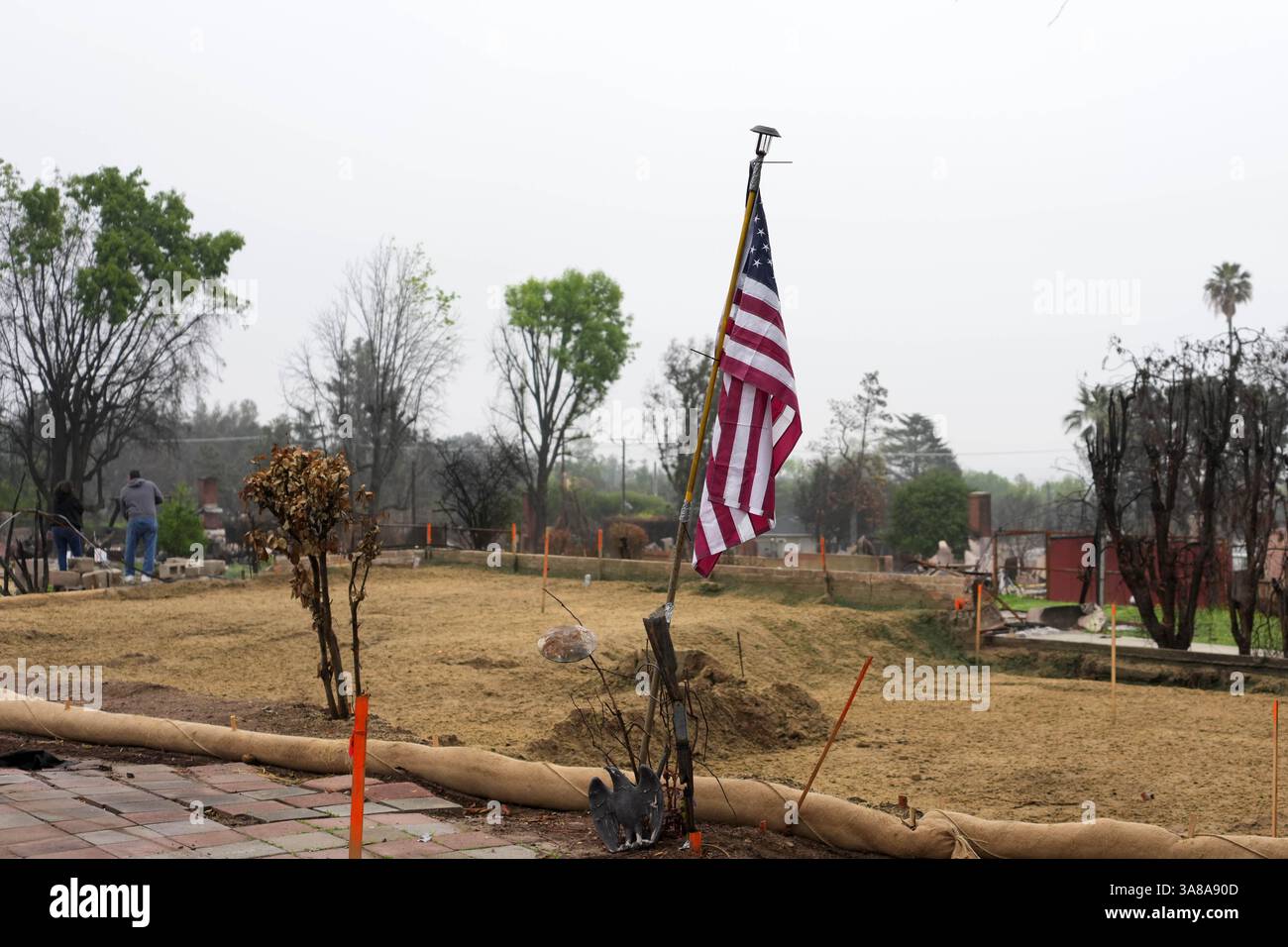 Altadena, United States. 26th Mar, 2025. A United States flag at a ...