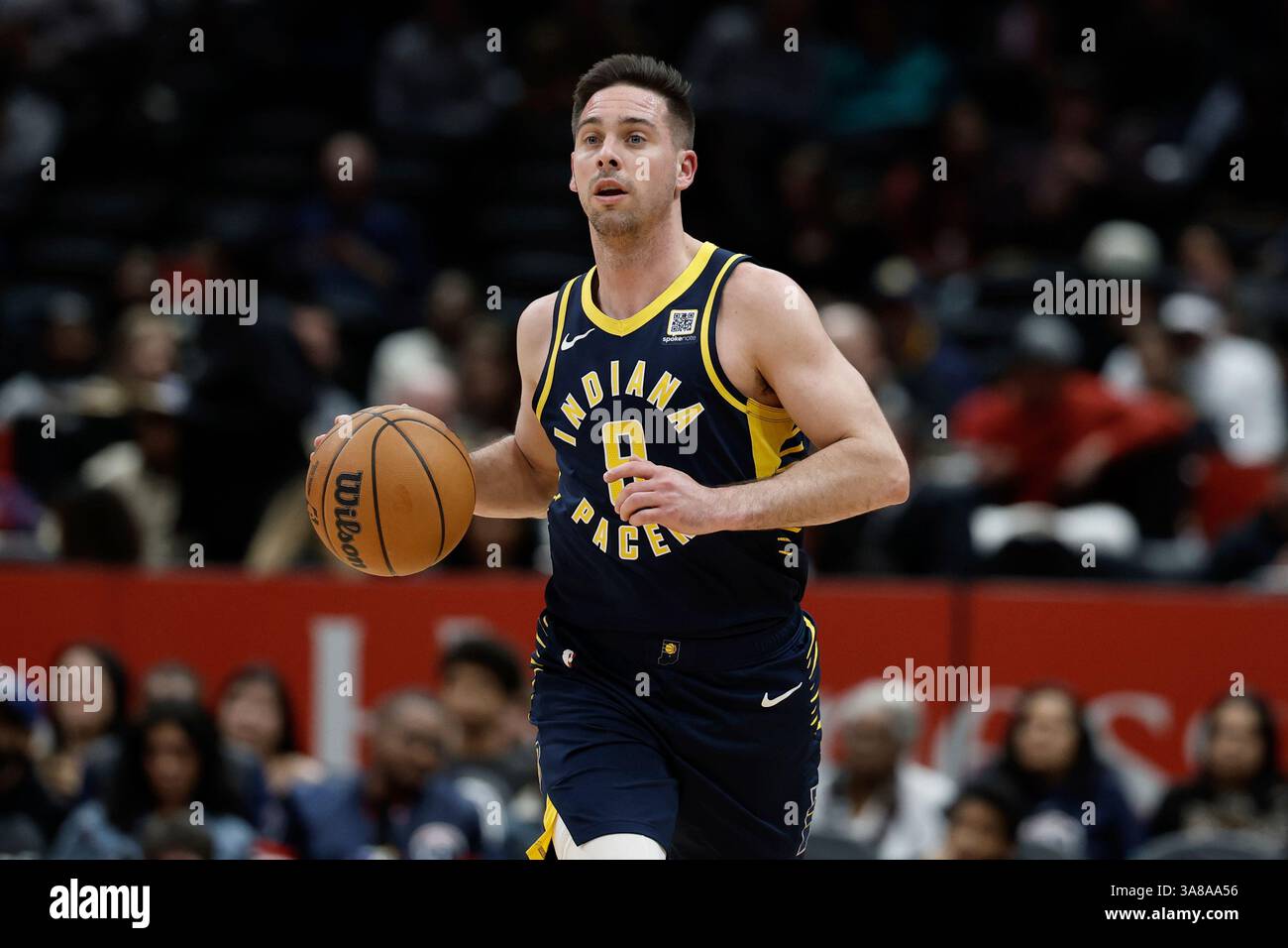 Indiana Pacers guard T.J. McConnell brings the ball up court during the ...