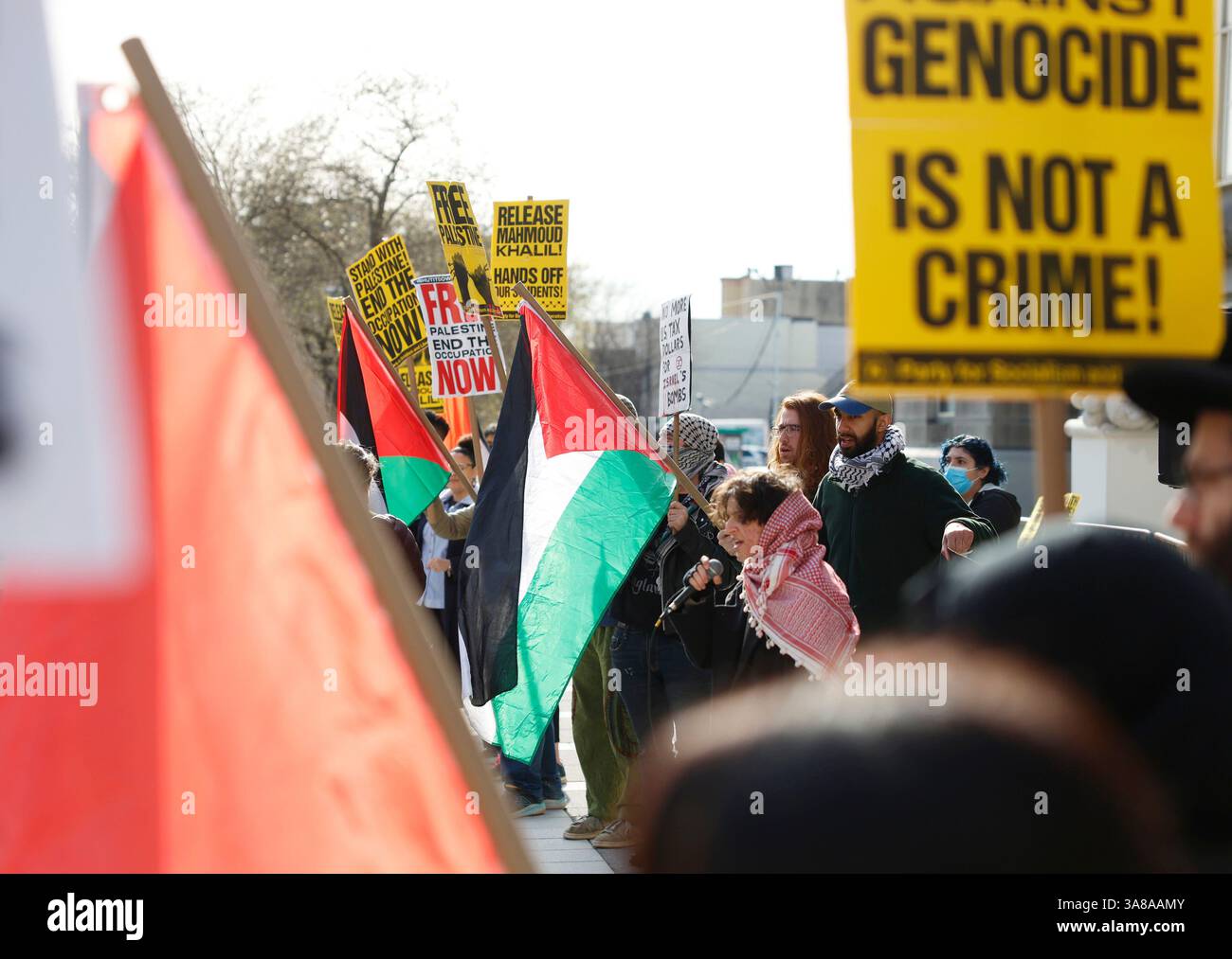 Newark, United States. 28th Mar, 2025. Protesters gather for a rally in ...