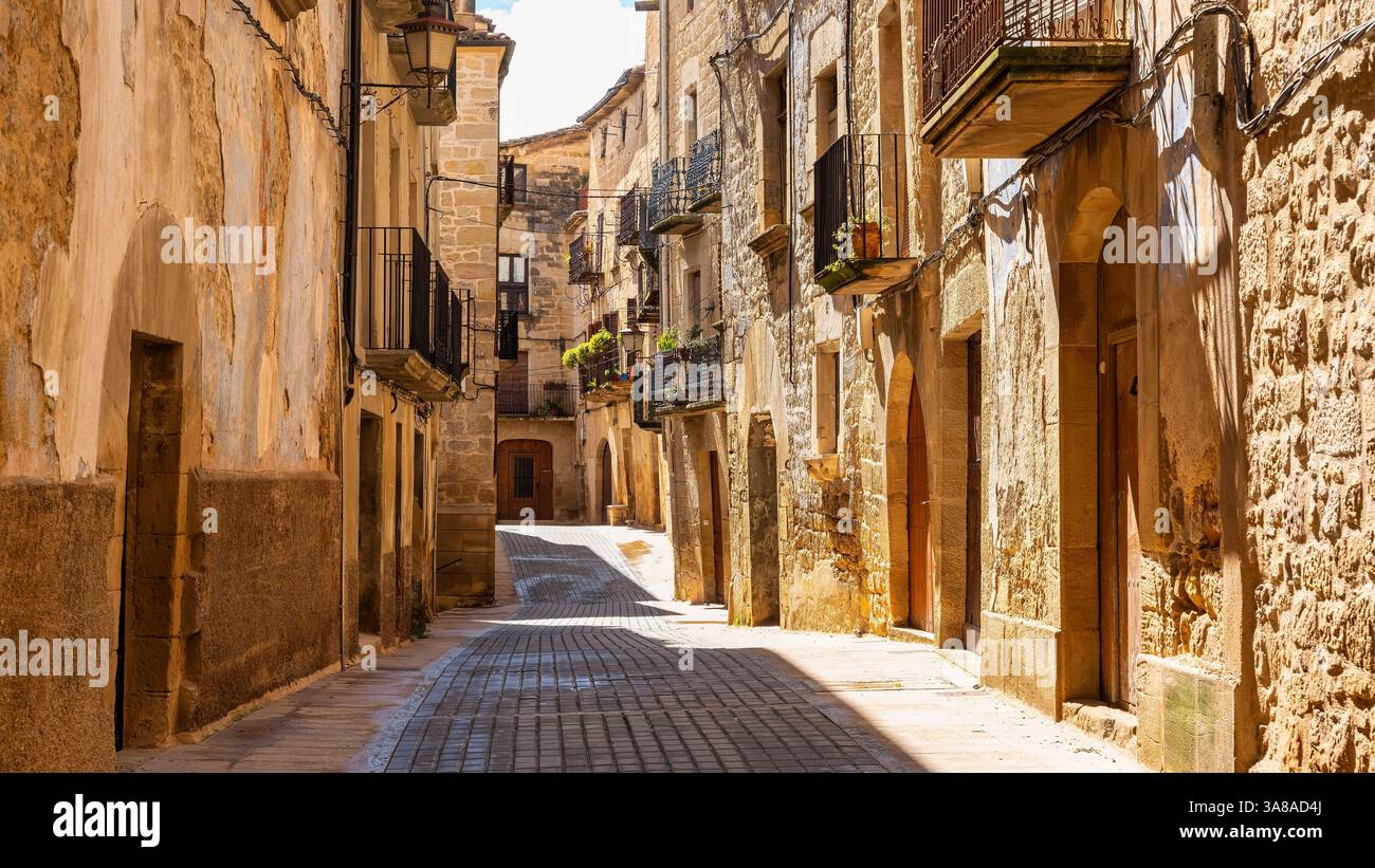 Picturesque alleys with medieval stone houses in the historic village ...